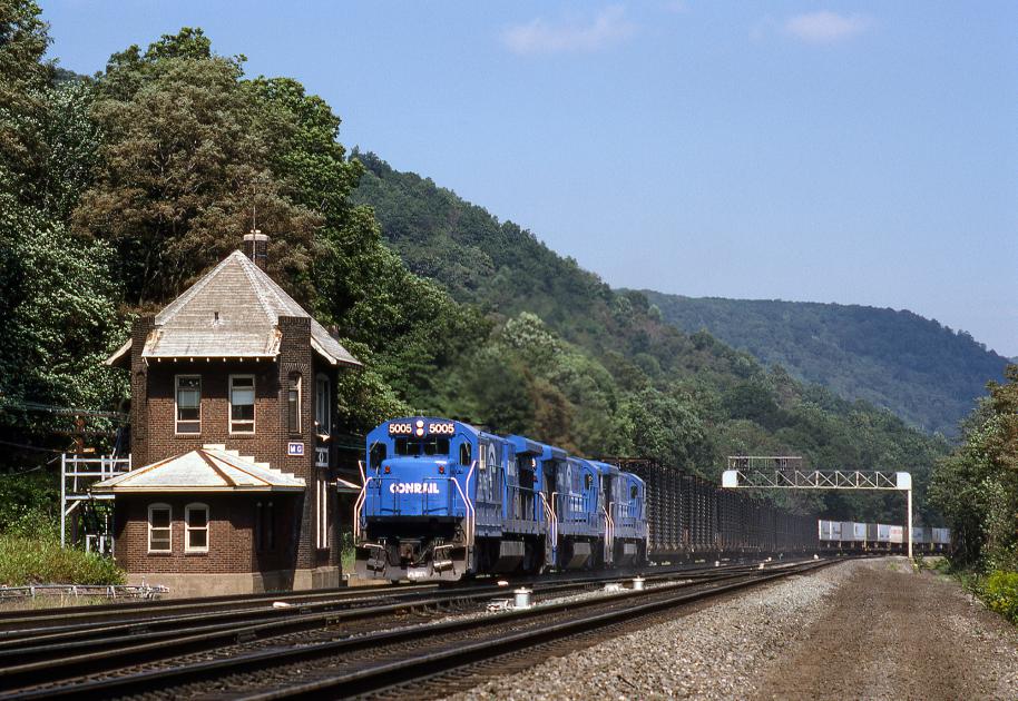 CR 5005 and two sisters bring a westbound Conrail intermodal train ...