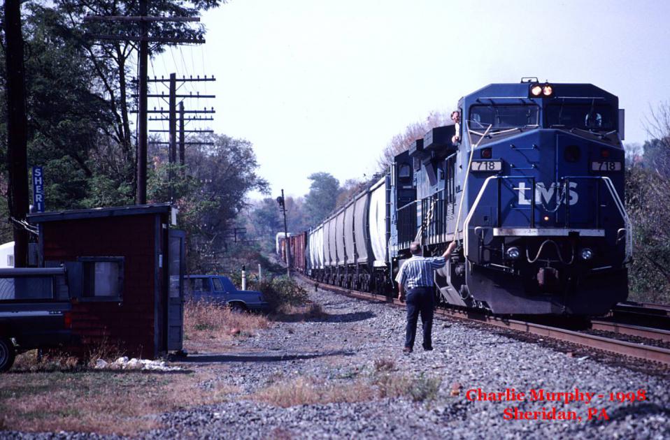 LMS 718 picks up a Form D at the Sheridan Block Station in October of ...