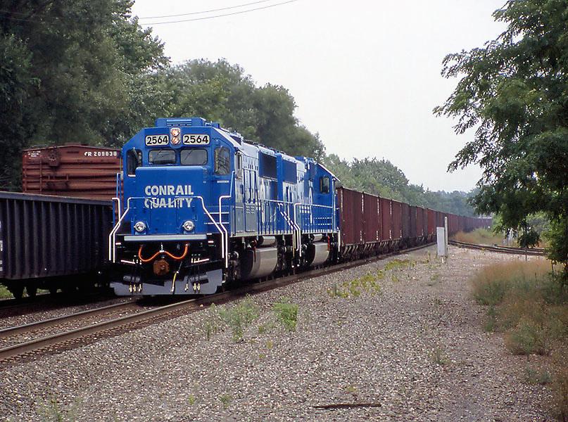 CR 2564 SD70 leads Northbound loaded coal train UOH-87 at West 32nd ...