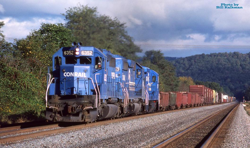 CR 6352, 6413, and 5047 with PIMO-4X on the Pittsburgh Line. 10/5/86 ...